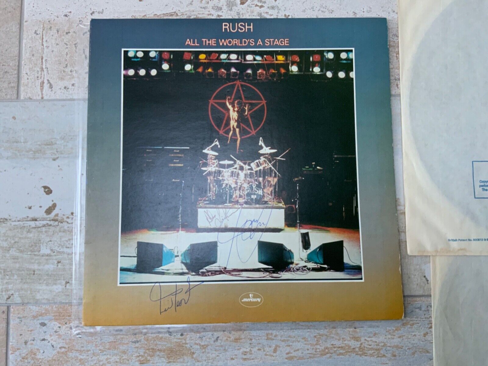 popsike.com - Rush ALL THE WORLD’S A STAGE signed by Geddy Lee Alex ...