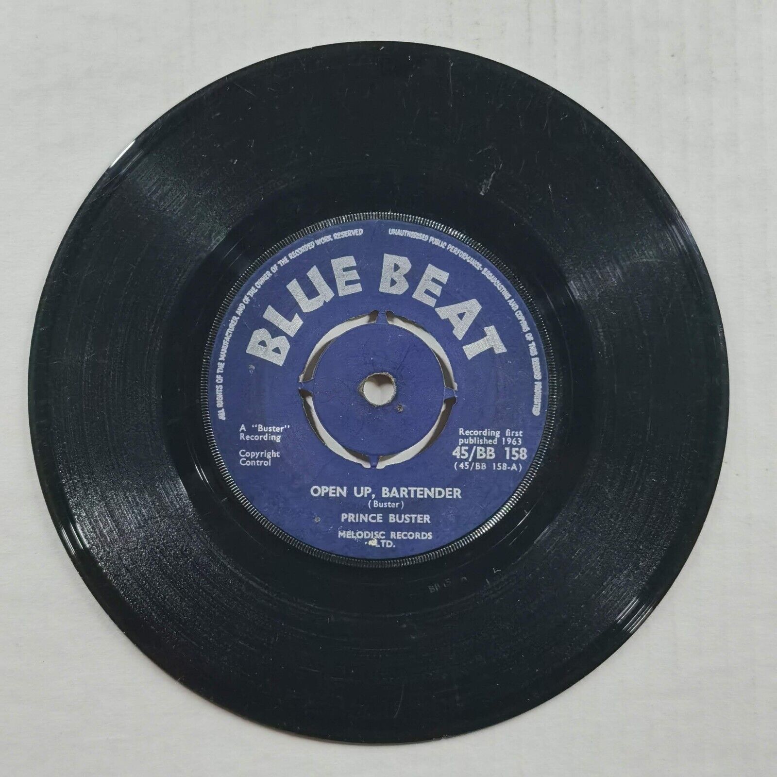popsike.com - PRINCE BUSTER - ENJOY IT / OPEN UP BARTENDER [ BLUE BEAT ...
