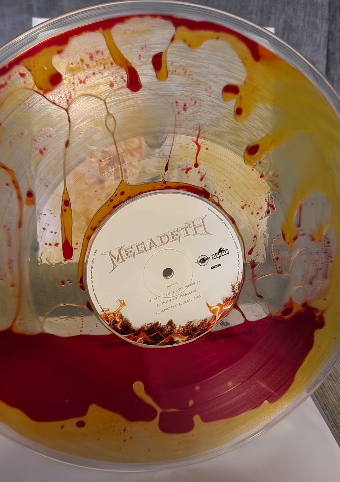 popsike.com - Megadeth Self-Titled 2026 Red Yellow Mixed Liquid Filled ...